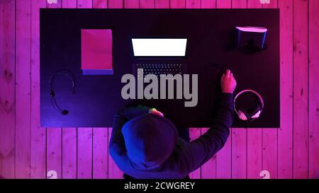 Gamer or streamer watching stream on a laptop Stock Photo - Alamy