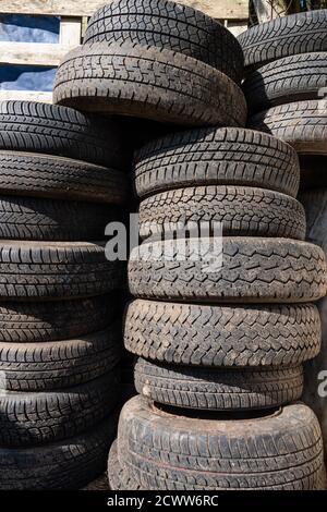A stack of old car tyres Stock Photo - Alamy