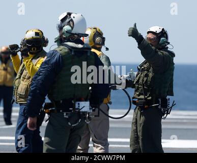 A Northrop Grumman BAT Unmanned Aircraft System drone flies over the ...