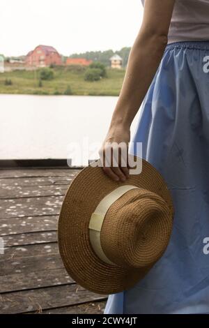 Young woman straw hat leaf garden countryside smile Asian outdoor ...