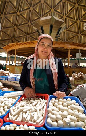 Kurt or kurut vendor selling inside Chorsu Bazaar, Tashkent, Uzbekistan ...