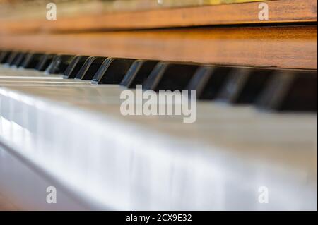 Up Close Picture of a refurbished Stand up piano Stock Photo - Alamy