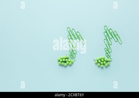 Music notes made of stationery on color background Stock Photo - Alamy