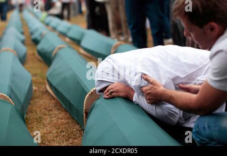 woman with coffin crying at funeral in church Stock Photo - Alamy