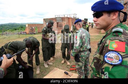 Soldiers from the Uganda People's Defence Force (UPDF) engage in ...