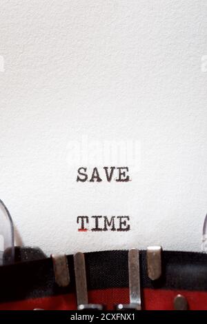Save time phrase written with a typewriter Stock Photo - Alamy