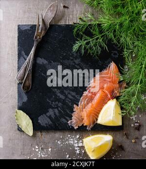 Sliced salted salmon fish fillet in the plate Stock Photo - Alamy