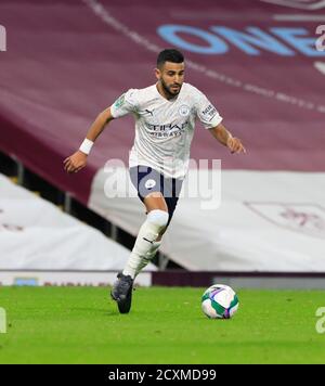 Riyad Mahrez (r) of Manchester City runs at Joe Bryan of Fulham during ...