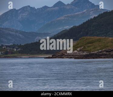Bodo, Norway - August 18, 2019: Mountain landscape, boat on the water ...
