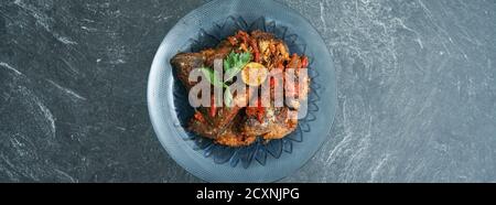 Grilled fresh seafood: parrot fish, octopus, shrimp food background ...