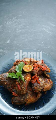 Homemade fried parrot fish with chilli is asian culinary food, served ...