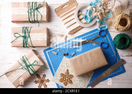 scrapbook background. christmas - girl packs gift Stock Photo - Alamy
