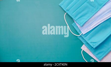Surgical masks on color background Stock Photo - Alamy