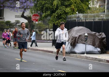 Los Angeles, CA/USA - April 22, 2020: Cars of protesters stretch as far ...