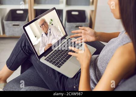 young Asian woman patient using smartphone video call consultation with ...