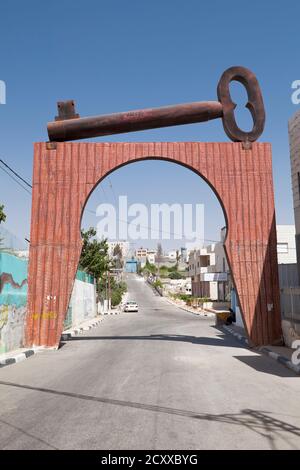 A key, symbol of the palestinian right of return, at the entrance of ...
