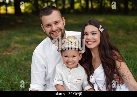 Beautiful family with a boy on summer day Stock Photo - Alamy