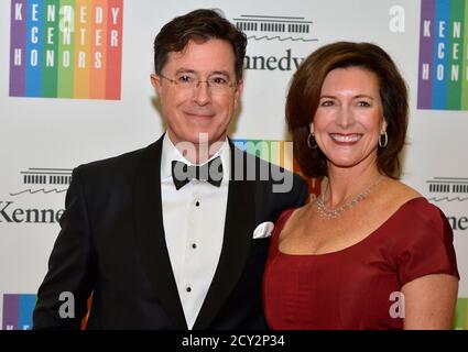 Comedian Stephen Colbert and his wife Evelyn pose for photographers on ...