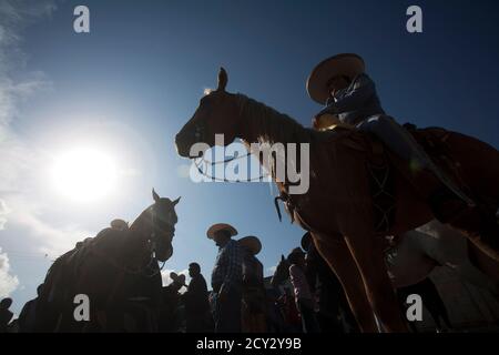 A Mexican charro ride his horse at the National Charro Championship in ...