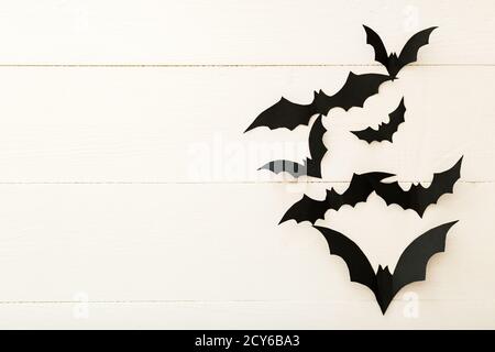 Halloween paper decorations on wooden background Stock Photo - Alamy