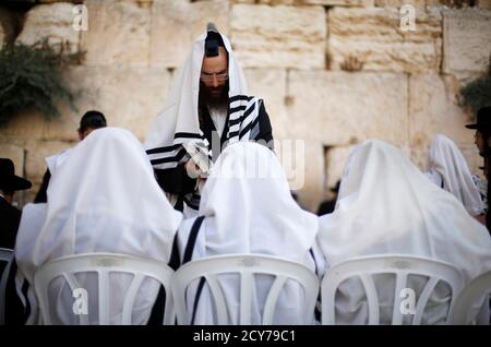 Prayer Shawls (Tallit) And Jewish Prayers Written In Hebrew On The ...