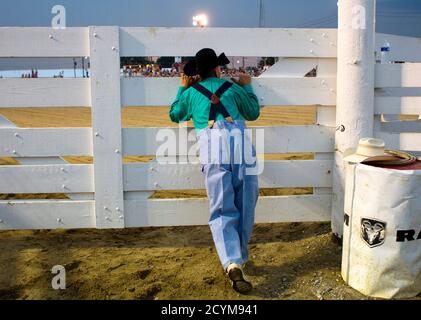 USA New Jersey Woodstown Rodeo cowboys watch Cowtown Rodeo from rough ...