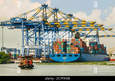 Container ship passing Fort Cochin on Vembanad Lake en route to ...