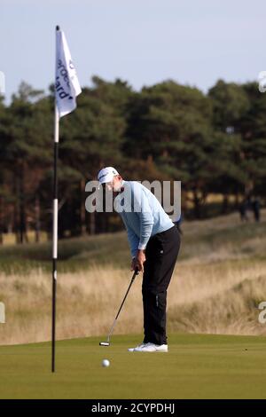 England's Ian Poulter putts on the 10th green during day one of The ...