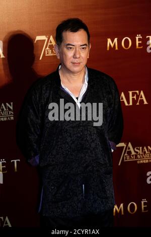 Hong Kong actor Anthony Wong poses with his trophy after winning "Best ...