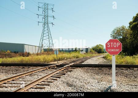 CSX railroad safety sign signaling to Stop and Dismount Close Clearance ...
