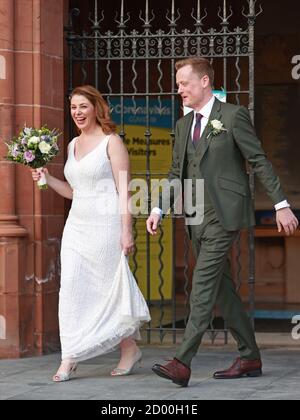Laura Dunseath and Gavin Maclure after their wedding at the Guildhall in Derry, which is ...