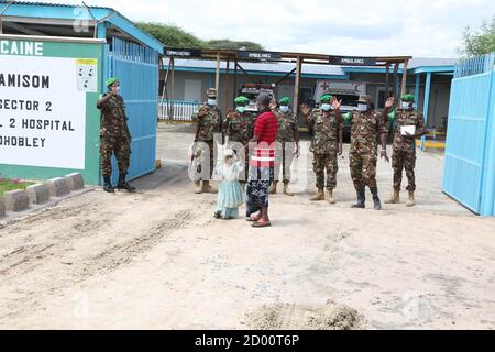 Soldiers from the Kenyan Defence Forces, Ugandan Army, and U.S. Army conducted a partnership run ...