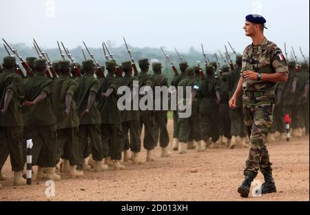 Soldiers from the Uganda People's Defence Force (UPDF) engage in ...