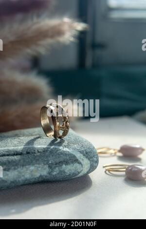 Brass metal pendant on natural background in the shape of cobra Stock ...