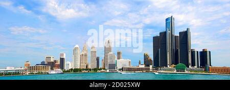 Panoramic view of Detroit city skyline at sunset from the shoreline ...