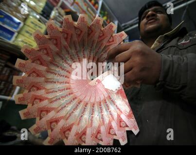 Garland of Indian currency Stock Photo - Alamy