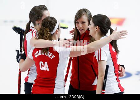 Team Homan third Emma Miskew, left to right, skip Rachel Homan, Team ...