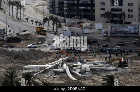 The Pearl of Bahrain or Pearl Monument in the centre of a roundabout in ...