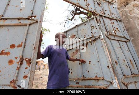 Bullet holes from the Civil War in the ruins of Angkor Wat Stock Photo ...