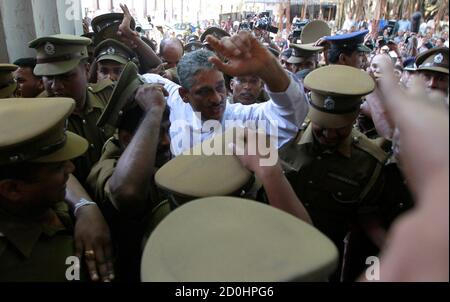 Flags of the Liberation Tigers of Tamil Eelam (LTTE) are waved at a ...