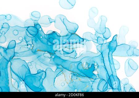 Alcohol ink blue transparent ink drops isolated on white background ...