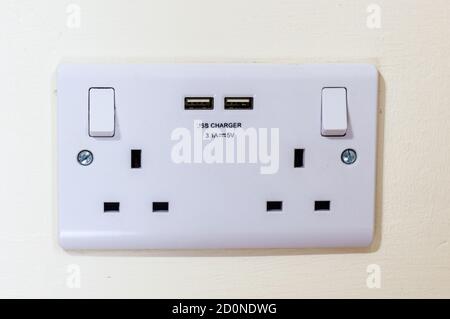 UK gang plug socket with USB outlets Stock Photo - Alamy