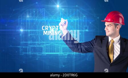 Handsome architect with helmet drawing MINING HARDWARE inscription, new ...