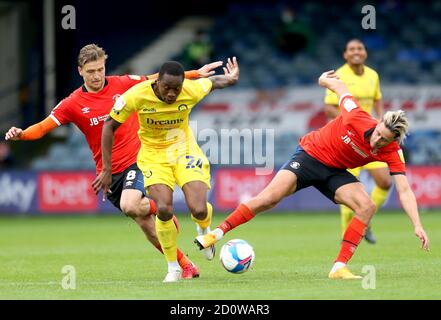 Luton Town's Luke Berry (centre) celebrates scoring their first goal of ...