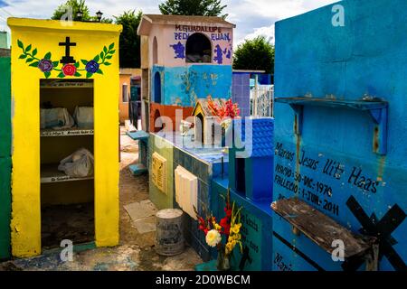 Colorful niches and above-ground tombs are seen during the bone ...