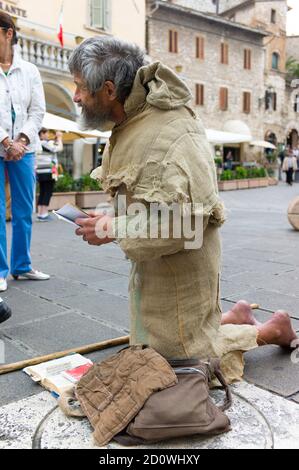 A man dressed as a medieval Friar, monk, or priest during a re ...
