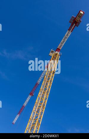 Worm's-eye view of tall "Matebat" tower crane on building site in Tours ...
