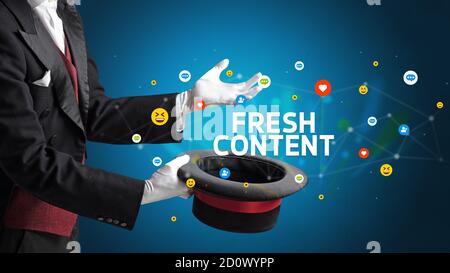Magician is showing magic trick with CONTENT STRATEGY inscription ...