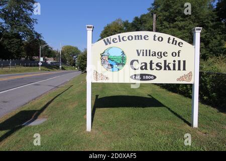 Welcome to Village of Catskill road sign wide angle with trees in ...
