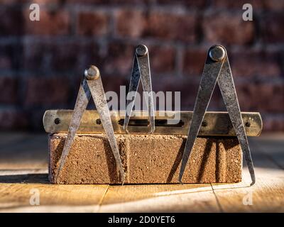 Set of three engineers odd leg callipers antique cobblers hammer on ...